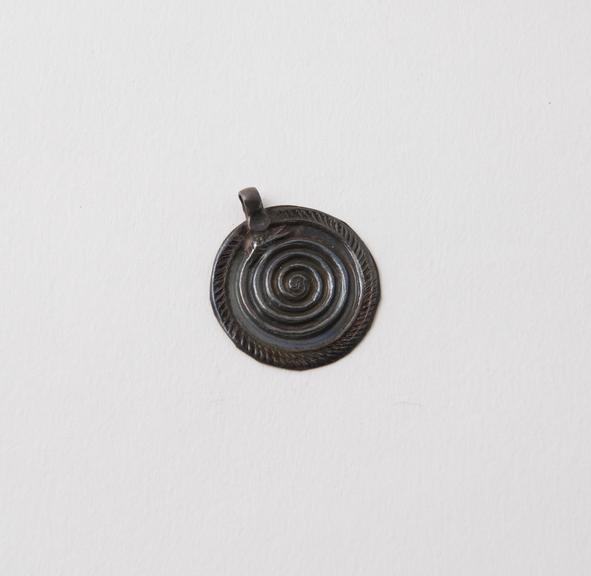Circular amulet and pendant oh Hindu pilgrims | Science Museum Group ...