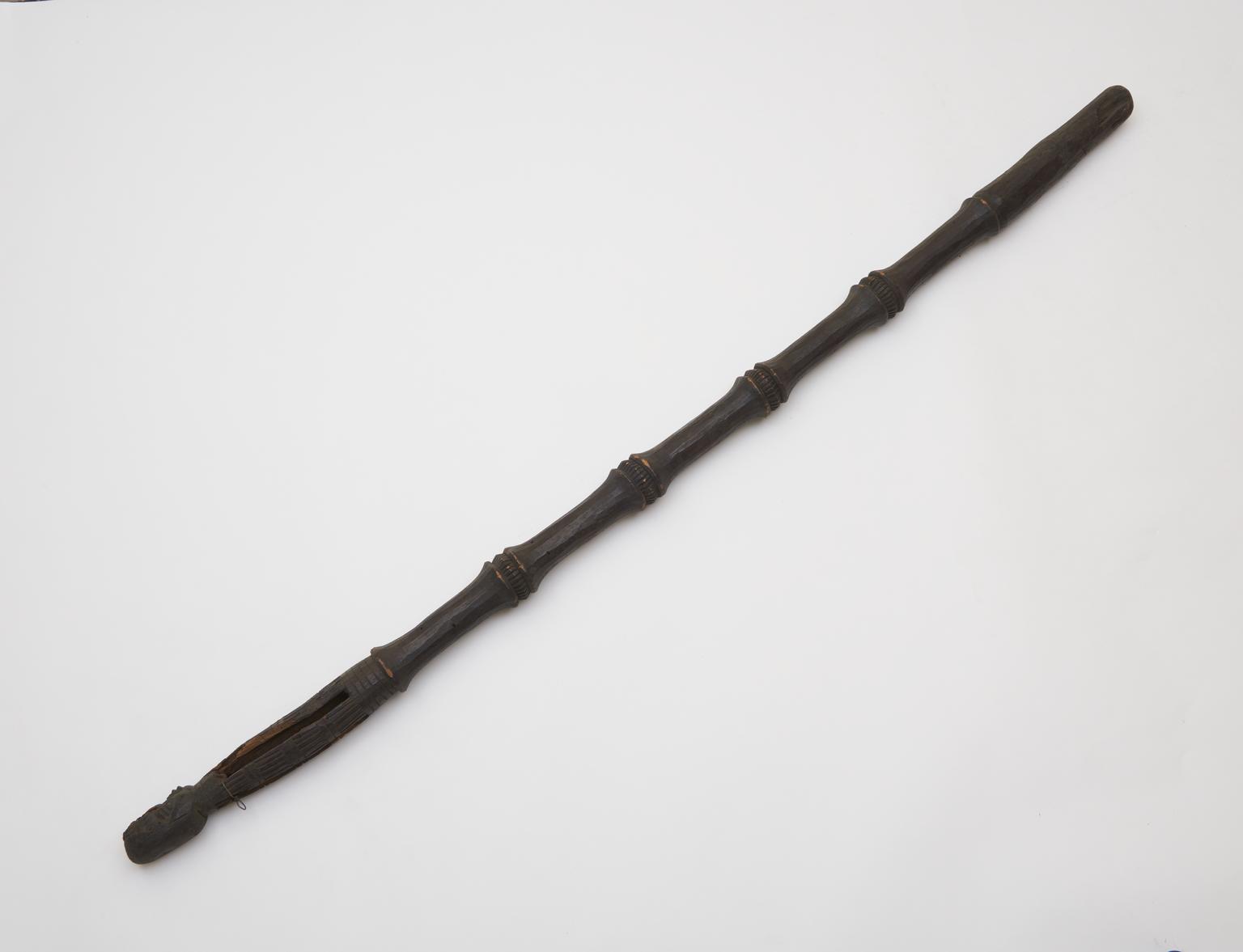 Large carved wooden staff with rattle | Science Museum Group Collection