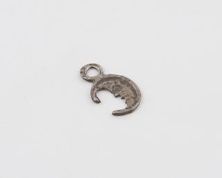 Silver amulet in the form of a crescent moon with face | Science Museum ...