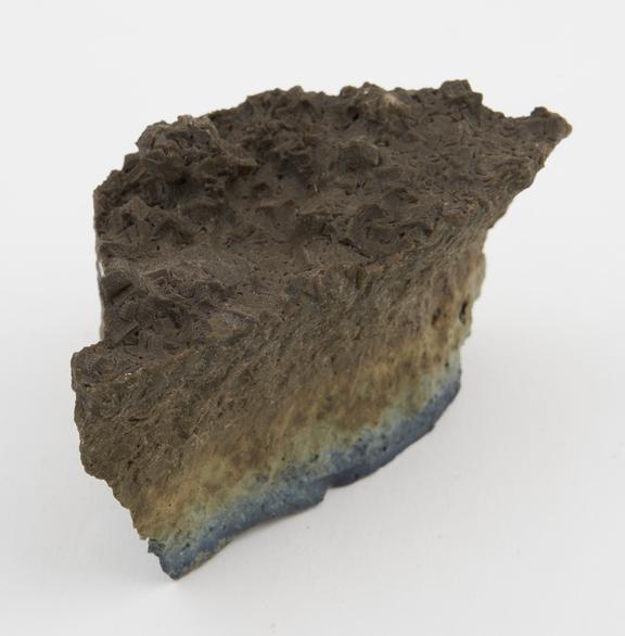 Piece of blast furnace slag, showing layers of different characters ...