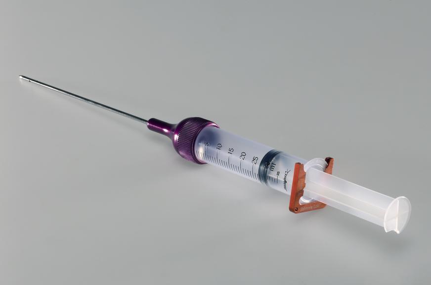 Large syringe used during liposuction procedures, Europe, 2000 ...