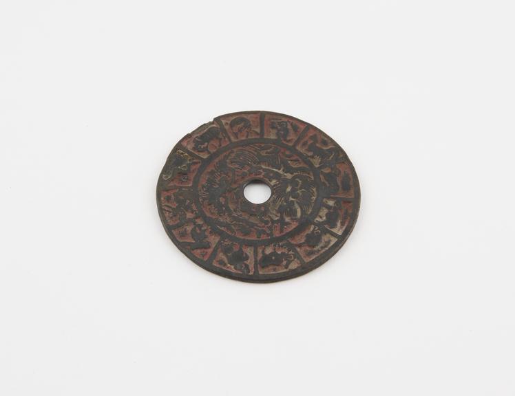 Disc amulet with signs of zodiac | Science Museum Group Collection