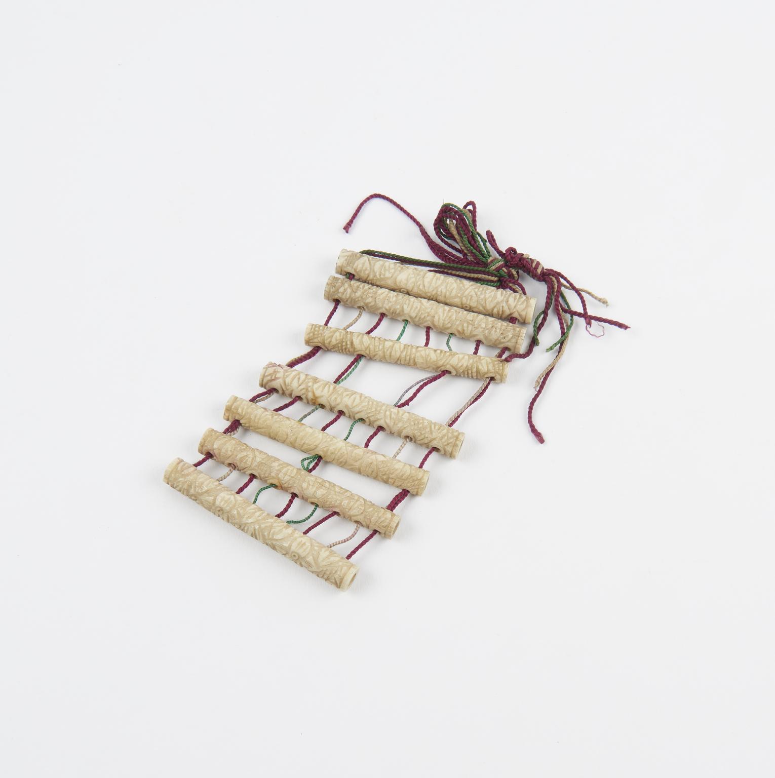 Ivory and thread toy | Science Museum Group Collection