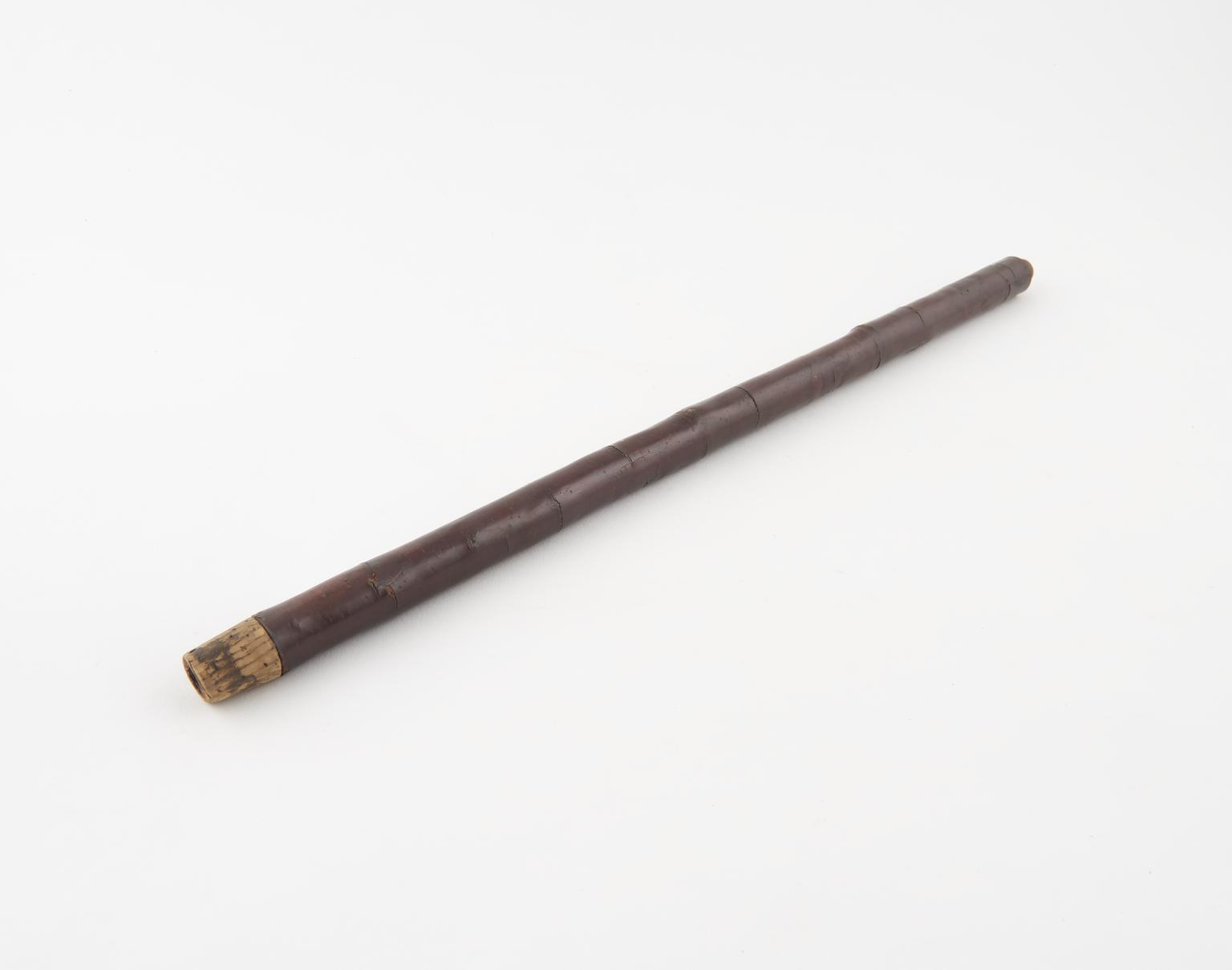 Two cherrywood tobacco pipe stems, one straight, one bowed | Science Museum Group Collection