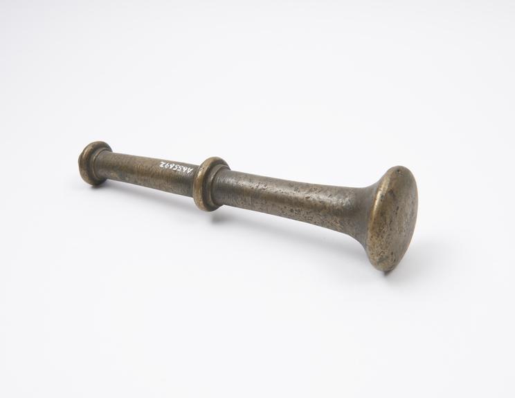 Brass pestle with central flange and tiered finial | Science Museum ...