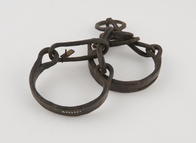 Pair of iron handcuffs | Science Museum Group Collection
