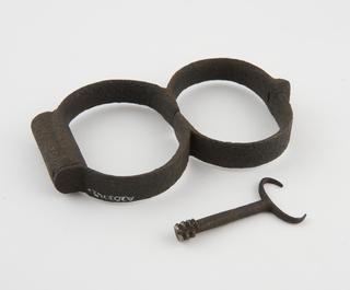 Handcuffs, with key | Science Museum Group Collection
