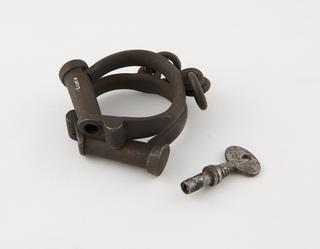 Handcuffs, with key | Science Museum Group Collection