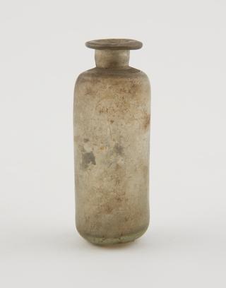 Glass bottle, cylindrical, weathered | Science Museum Group Collection