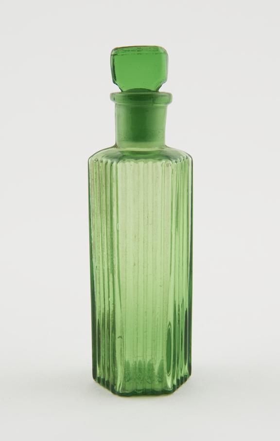 Hexagonal green glass bottle with tall neck and stopper | Science ...