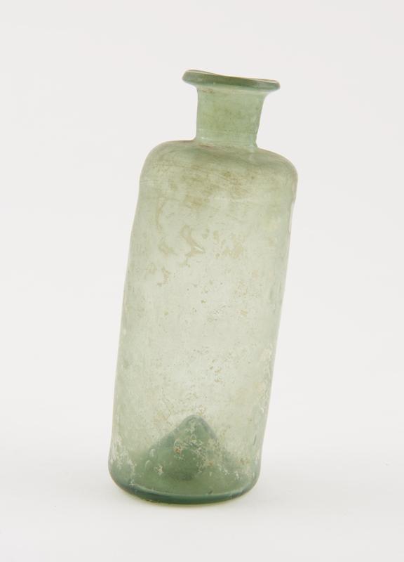 Cylindrical green glass bottle | Science Museum Group Collection