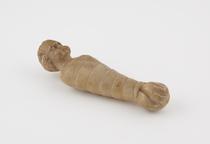 Small alabaster figure of a child | Science Museum Group Collection