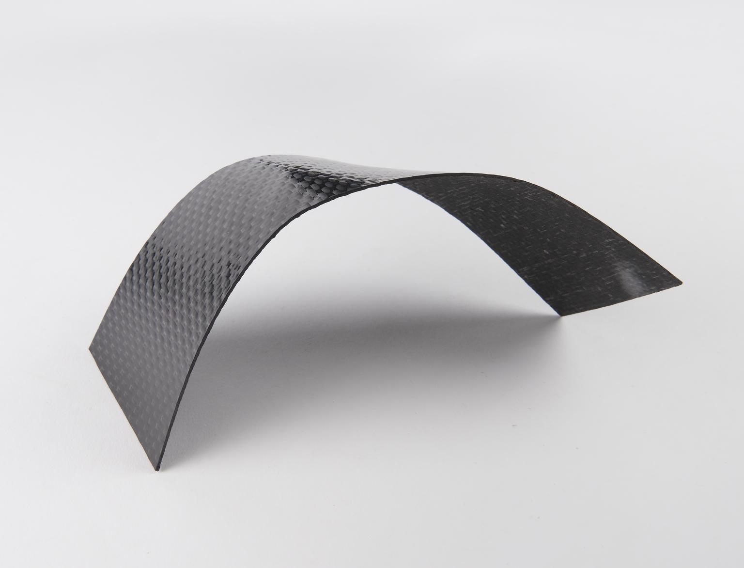 Curved sample of carbon-fibre-reinforced shape-memory polymer | Science ...