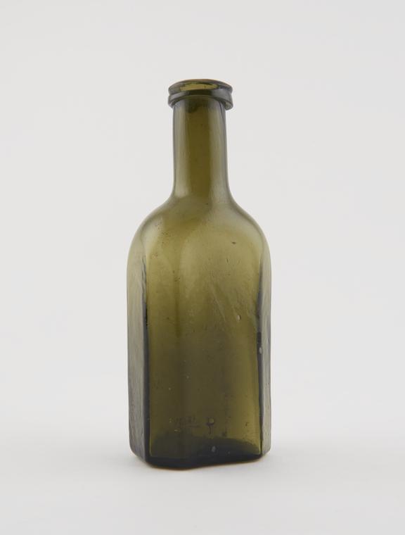 Dark green glass bottle | Science Museum Group Collection