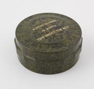 Circular green mottled container | Science Museum Group Collection