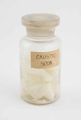 Glass bottle of caustic soda | Science Museum Group Collection
