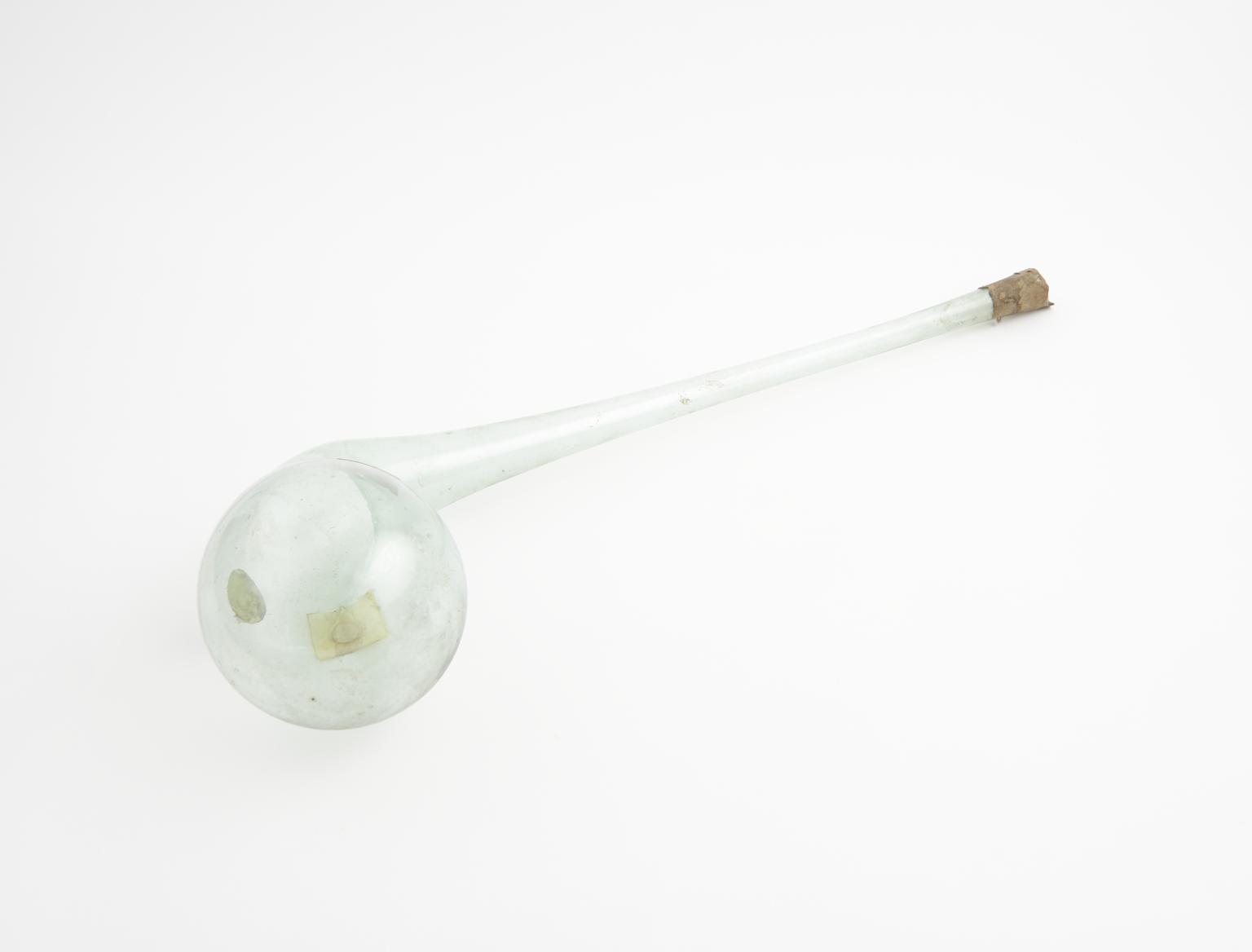 Small green glass retort | Science Museum Group Collection