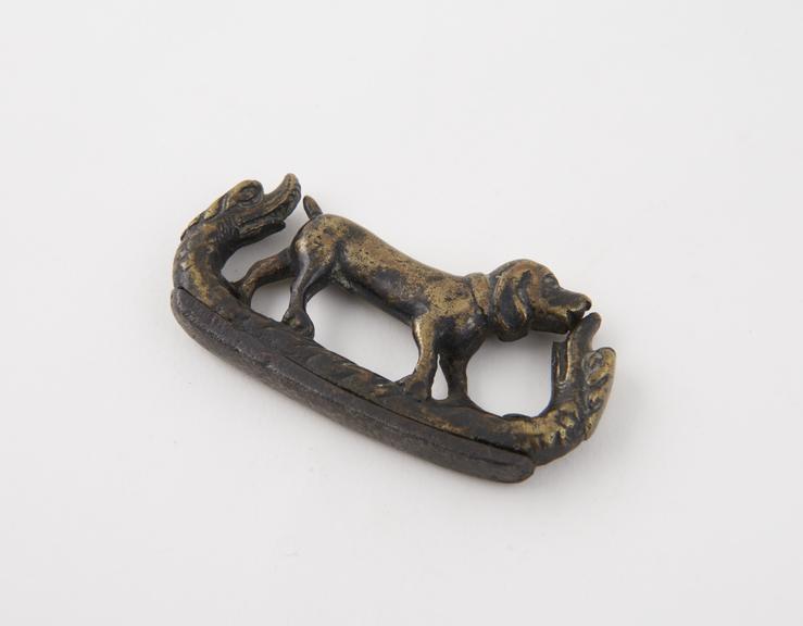 Fire-steel (length 2 5/8 ins) of small size; hand-hold at back in form ...