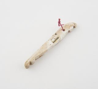 Peg-like white shell(?) amulet, reputedly a figuri | Science Museum ...