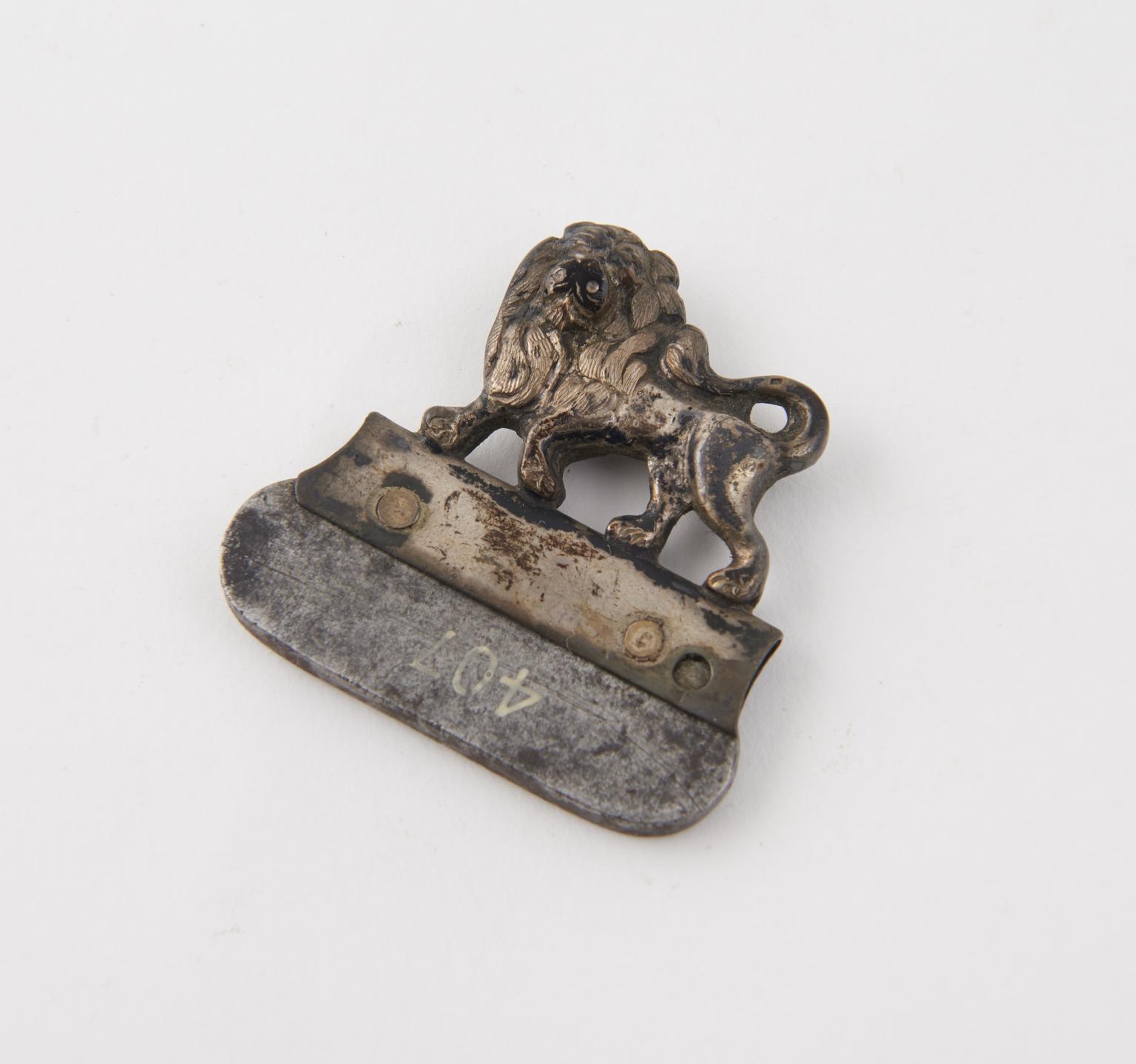 Fire-steel (length 1 5/8 in); small and thin; rivetted on to a hand ...