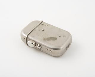 One of Two Lighters (length 2 1/2 ins) of identical make; both of iron ...