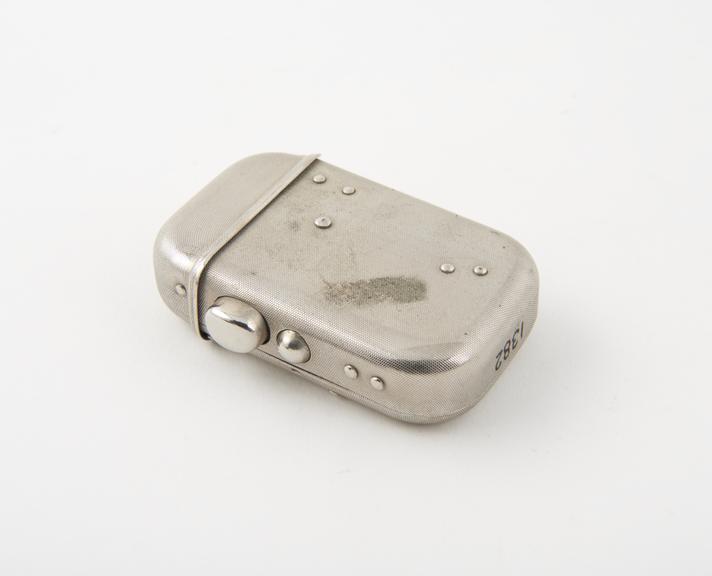 One of Two Lighters (length 2 1/2 ins) of identical make; both of iron ...