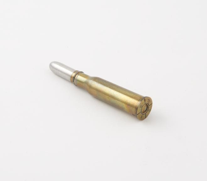 One of three lighters made from German brass rifle-cartridges and ...