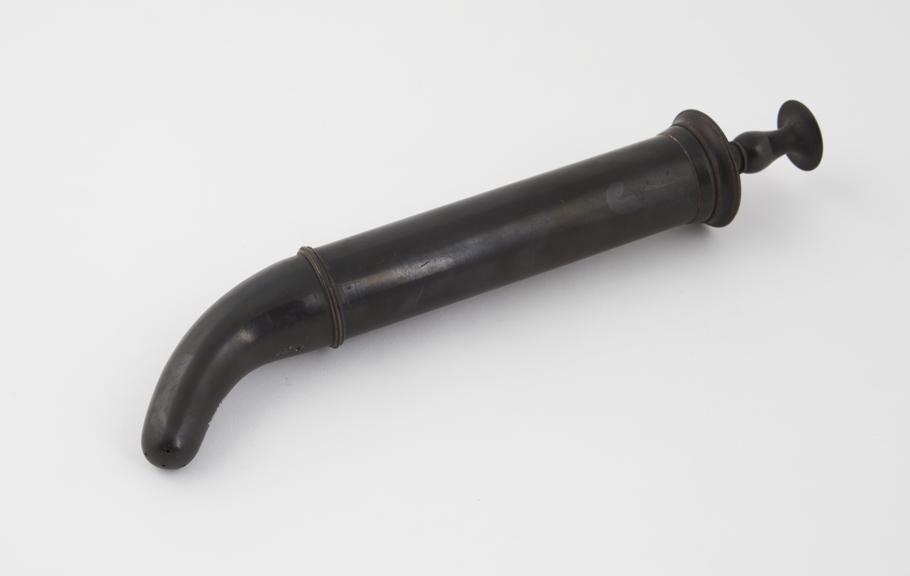 Vulcanite vaginal syringe, piston-action | Science Museum Group Collection