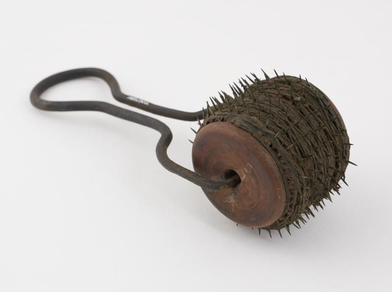 Scarificator(?) consisting of wooden roller with m | Science Museum ...