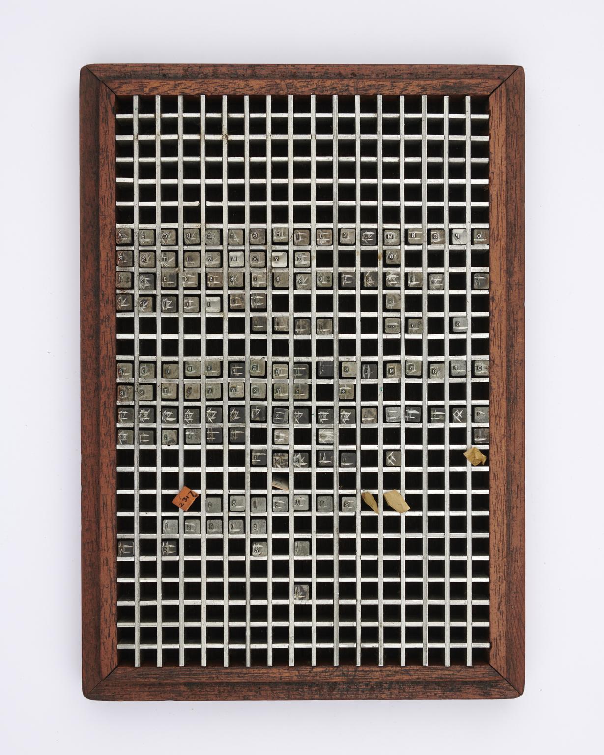 0.2 inch composition punches for Spartan Light Condensed (typeface ...