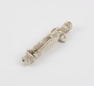 Small white plaster figure of female applying binder | Science Museum ...