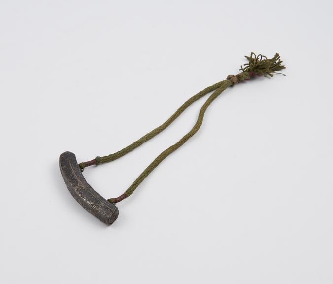 Banana-shaped silver amulet case | Science Museum Group Collection