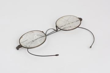 Pair of steel-rimmed spectacles with shattered lenses | Science Museum ...
