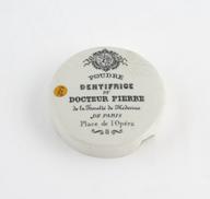 Ceramic pot lid for tooth powder | Science Museum Group Collection