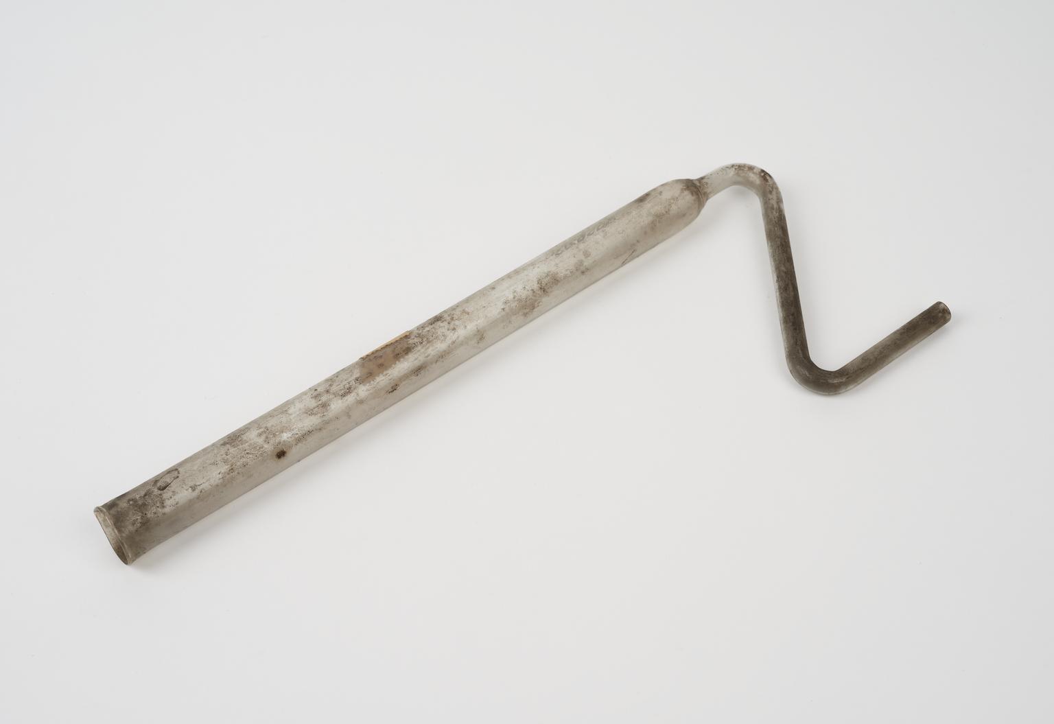 Long cylindrical test tube with narrower z-bend tube coming out at the ...