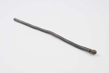 Flexible lead tube with brass teat at end | Science Museum Group Collection
