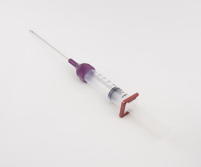 Large syringe used during liposuction procedures, Europe, 2000 ...