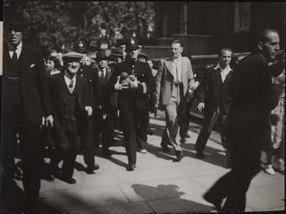 A photographic print of Political, Demonstrations, Fake "Bomb" Throwing ...