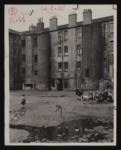 A photographic print of Home & Housing, Post War, Slums & Living ...