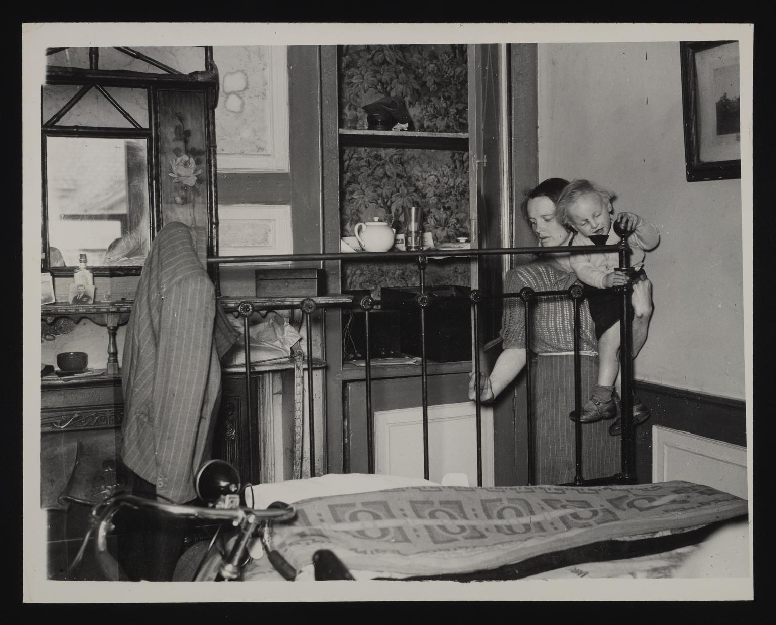 A photographic print of Home & Housing, Post War, Slums & Living ...