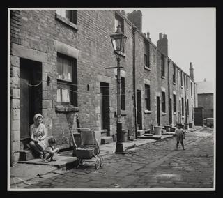 A photographic print of Home & Housing, Post War, Slums & Living ...