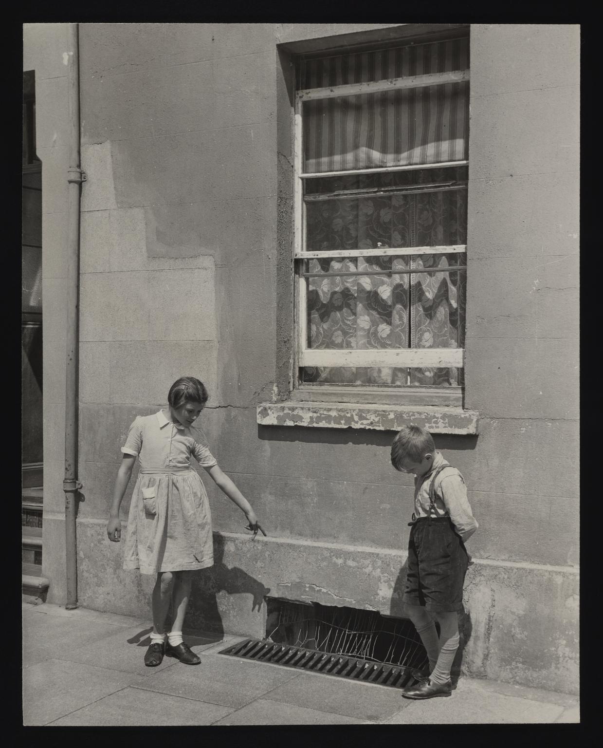 A photographic print of Home & Housing, Post War, Slums & Living ...