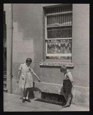 A photographic print of Home & Housing, Post War, Slums & Living ...