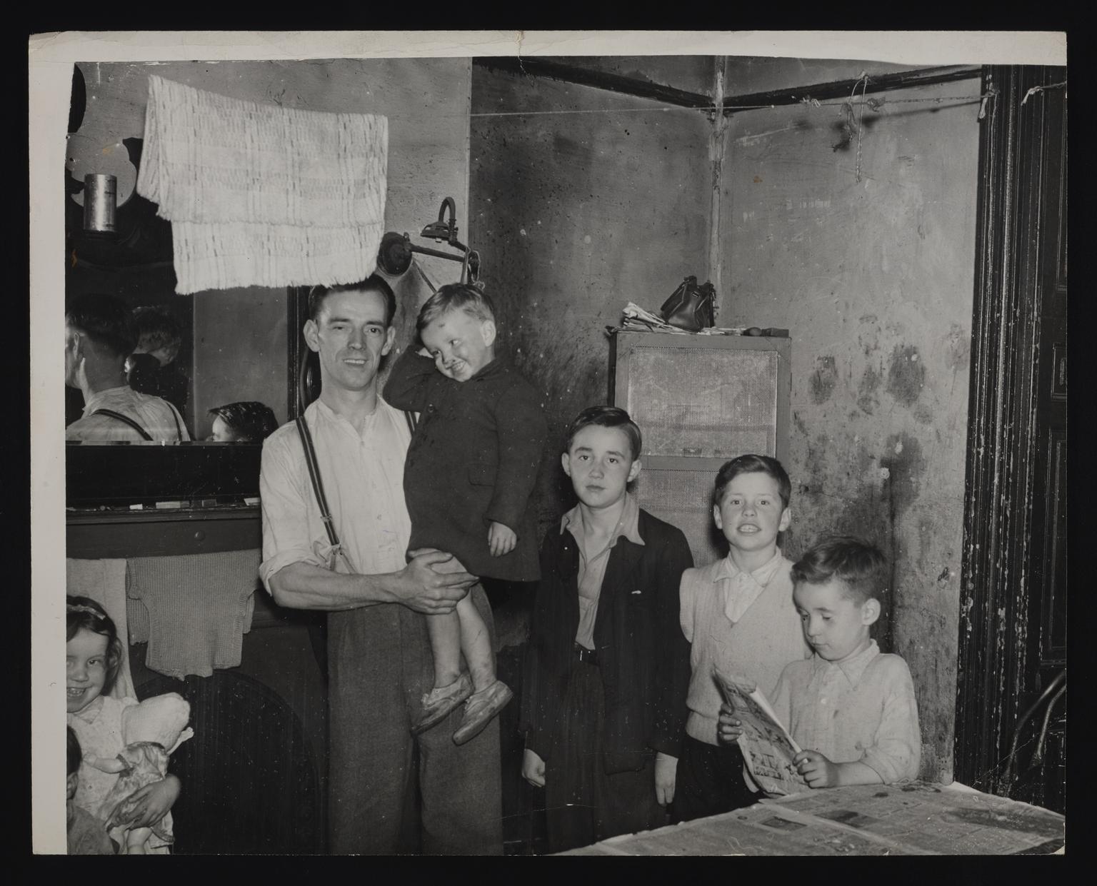 A photographic print of Home & Housing, Post War, Slums & Living ...