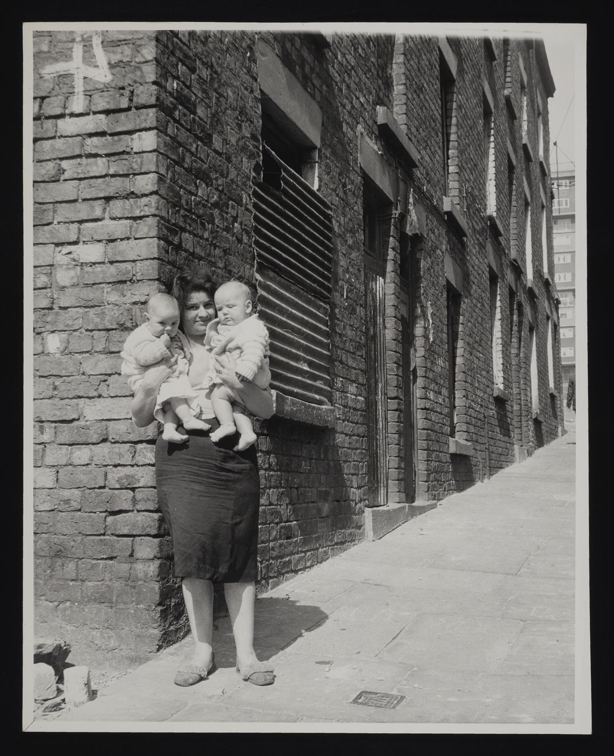A photographic print of Home & Housing, Post War, Slums & Living ...