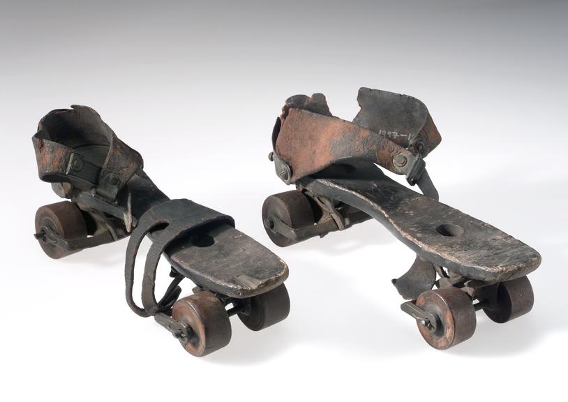 Pair of wooden roller skates, 1870-1890. | Science Museum Group Collection