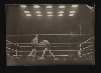 A photographic print of Sports, Boxing, Doyle v Petersen, 12.7.33 ...