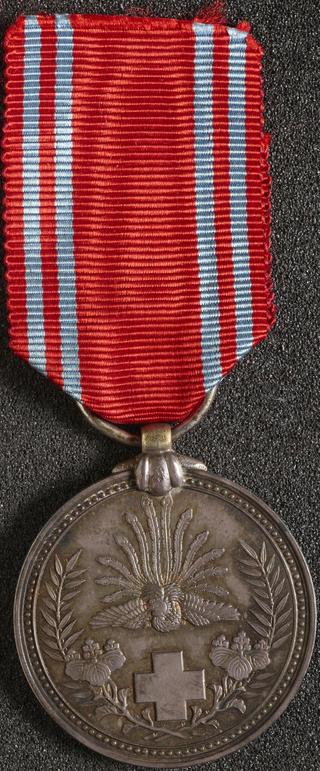 Silver medal and ribbon of silk | Science Museum Group Collection