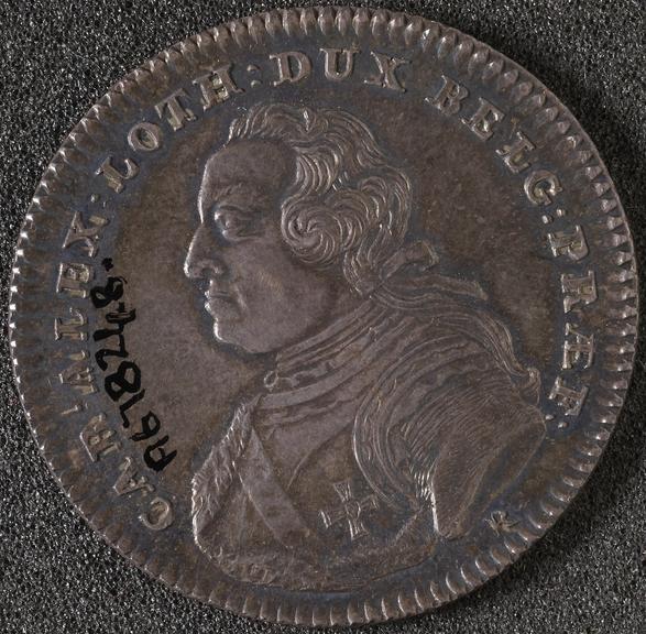 Reeded silver medal commemorating the work of Charles Alexander Loth ...