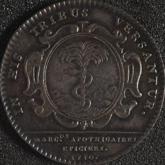 Reeded silver token advertising merchants | Science Museum Group Collection